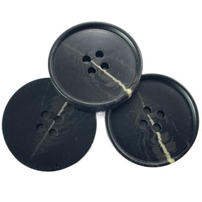 China Resin Fake Horn Button 40L Four Hole Imitation Horn Effect with Flat Back for Garment for sale