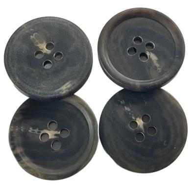 China Round Matte Finished Plastic Coat Faux Horn Buttons 36L Four Hole Eco-Friendly Resin for sale