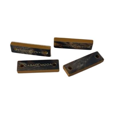 China Rectangle Badge Desgin Fancy Plastic Buttons  Engraved Logo Sew On Type Diy Material for sale
