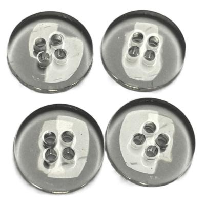 China Transparent 24L 4 Hole Plastic Buttons Double Face Spray Shiny Oil for Clothes for sale