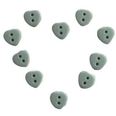 China Plastic Resin Heart Shape Chalk Buttons 16L 2 Hole Cyan for Shirt DIY Sewing for sale
