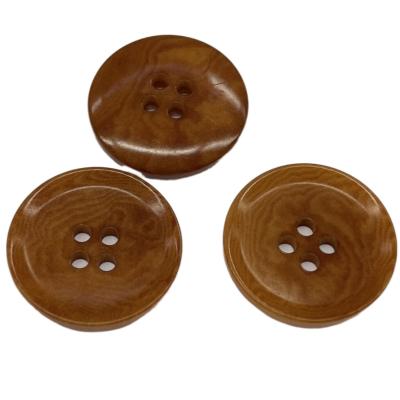 China Natural Corozo Buttons 36L Dye Brown with Rim Eco Friendly for Coats for sale