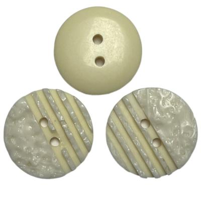 China Polyester Imitation Shell Button Irregular Face Two Hole 28L Yellow for Garment for sale
