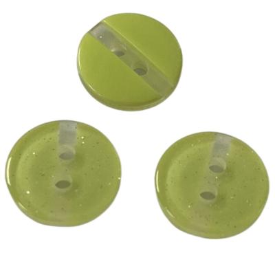 China Eco-Friendly Resin Glitter Effect Two Hole Plastic Shirt Buttons 22L with Chalk Slot for sale