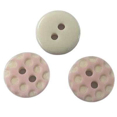 China Plastic Resin Blouse Buttons Two Hole 16L Pink Color Special Face Design for Sewing for sale