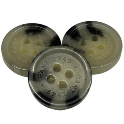 China 26L Engraved Logo Fake Horn Button 4 Hole Brown Resin Coat Button for sale