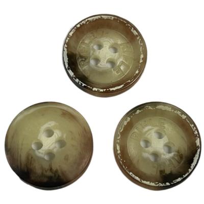 China Natural Horn Buttons Four Hole 36L Engraved Logo for Overcoat Coat for sale