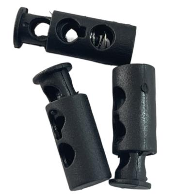 China ODM Fancy Plastic Stoppers 2.8g with Spring for Hoodies Coat 35x10mm for sale