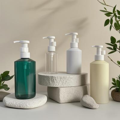 China 300ml-500ml PET Cylinder-Shaped Lotion Pump Bottle for Cosmetic Packaging with Customizable Logo Print for sale