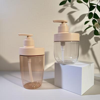 China 400ml 500ml PET Plastic Cosmetic Bottle with Press Pump for Essential Oil Shampoo and Lotion for sale