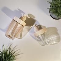 China 400ml 500ml PET Plastic Cosmetic Bottle with Press Pump for Essential Oil Shampoo and Lotion for sale