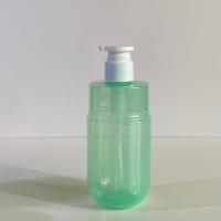 China 300ml Capacity Transparent Green PET Pump Dispenser Bottle for Cosmetic Lotion with Custom Logo for sale