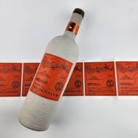 China Custom Orange PU Leather Wine Bottle Labels with Embossed Texture - 500 MOQ, 5-7 Day Production for sale