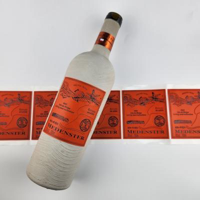 China Custom Orange PU Leather Wine Bottle Labels with Embossed Texture - 500 MOQ, 5-7 Day Production for sale