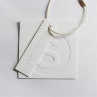 China Custom Embossed Clothing Tags - Eco-Friendly Paper Labels for T-Shirts & Retail Products with OEM/ODM Customization for sale