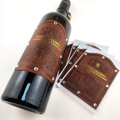 China Custom PU Leather Wine Bottle Labels with Gold/Silver Foil Stamping - 500pcs MOQ, 5-7 Day Production for sale