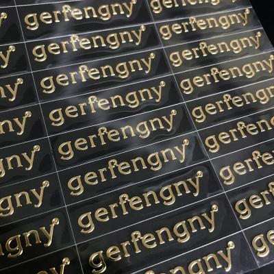 China Custom Printed Vinyl Logo Transfer Sticker Clear 3D Metal Sticker Transfer Foil Stamping Hot Silver UV Transfer Sticker for sale