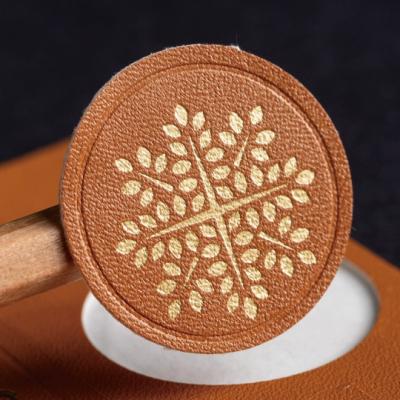 China High Quality Self Adhesive Leather Embossed Textured Pu Labels Candle Aromatherapy Labels Leather Labels With Stickers for sale