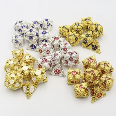 China Custom Brass Hollow Dice Set with Polyhedral Design and Personalized Logo for DND Games for sale