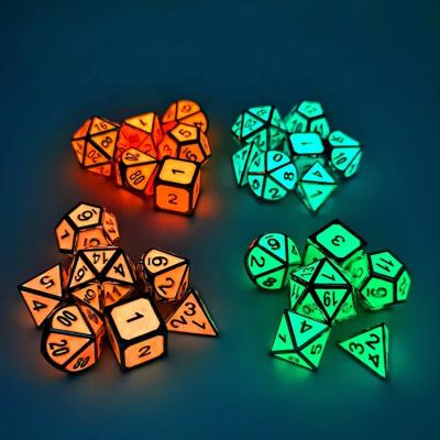 China Zinc Alloy Glow in the Dark Metal Dice Set for DND Games with Customizable Logo for sale