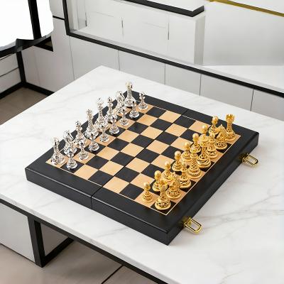 China Antique Bronze & Silver Hollow Carved Brass Chess Set for Luxury Tabletop Decor and Tournament Play for sale