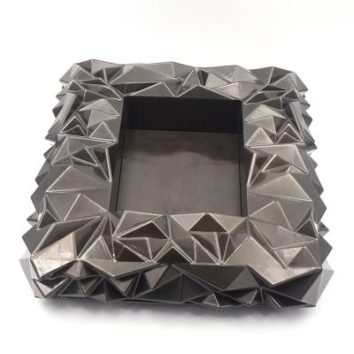 China Square 3D irregular rock geometric surface metal ashtray with matte gunmetal finish and scratch resistant design for sale