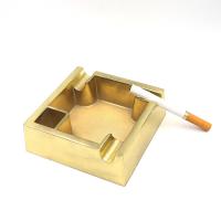 China Square polished gold metal ashtray with multi-groove design and independent storage compartment for luxury decor for sale