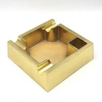 China Square polished gold metal ashtray with multi-groove design and independent storage compartment for luxury decor for sale