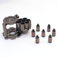 China Rotatable revolver cylinder metal dice set with bullet-shaped polyhedral dice and gunmetal finish red numbers for sale