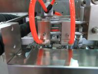 China EM130 Automatic Bag Packing Machine 30-70bags/Min Speed 1500KG Weight for sale