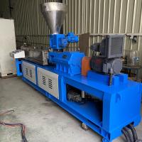 China Used 65-barrel twin-screw extruder for sale