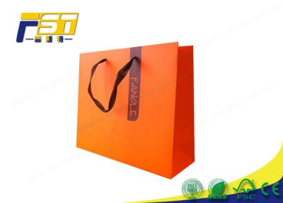 China Custom CMYK Kraft Paper Shopping Bags with Logo 300gsm Durable Cardboard Packaging for sale