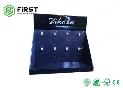 China Custom Printed Cardboard Counter Display Stand with Hooks 150gsm Wave 350gsm CCNB for sale