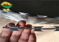 China Bto-22 450mm Coil Galvanized Concertina Barbed Wire Security Razor Wire Rustproof for sale