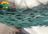 China Crossed 450/500/600mm Coil Concertina Barbed Wire Green Coated EN Standard for sale