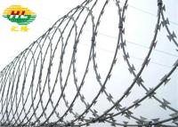 China Flat Style Galvanized Razor Blade Barbed Wire 450mm Coil Acid Resistance for sale