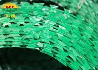 China Crossed 450/500/600mm Coil Concertina Barbed Wire Green Coated EN Standard for sale
