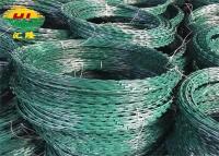 China Anticorrosion Green Pvc Coated Concertina Barbed Wire 1400-1500MPA for sale