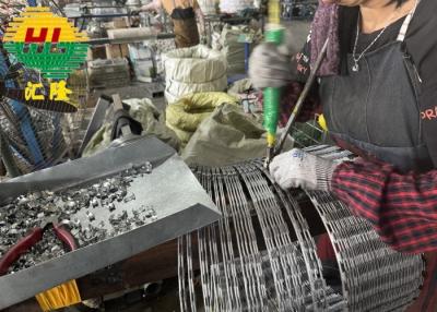 China Anti Theft Nestor Rolling Cage Razor Blade Wire Galvanized for sale