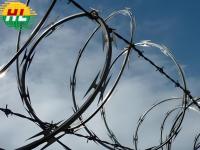 China Lay Flat High Security Razor Sharp Barbed Wire Galvanized for sale