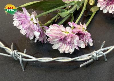 China HUILONG 15 gauge barbed wire , 2 Point 12x12 Roll Of Razor Wire for sale
