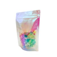 China Custom Rainbow Holographic Pink Color Stand Up Pouches with Resealable Zipper for Packaging Food, Candies, Accessories, for sale