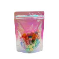 China Custom Rainbow Holographic Pink Color Stand Up Pouches with Resealable Zipper for Packaging Food, Candies, Accessories, for sale