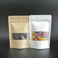 China Custom Printed White Stand Up Kraft Paper Bags with Matte Clear Window with Zipper for Candy, Snacks, Food Packaging for sale