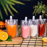 China Heavy Duty Retortable Stand Up Spout Pouches with Reusable Lid Cap for Beverage Packaging for sale
