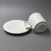 China EEC Standard Embossed White New Bone China Teacup and Saucer Set 250ml for Afternoon Tea for sale