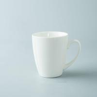 China 12oz 350ml Embossed New Bone China Coffee Mug with Ergonomic Handle for sale