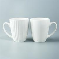 China 12oz 350ml Embossed New Bone China Coffee Mug with Ergonomic Handle for sale