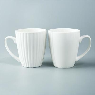 China 12oz 350ml Embossed New Bone China Coffee Mug with Ergonomic Handle for sale