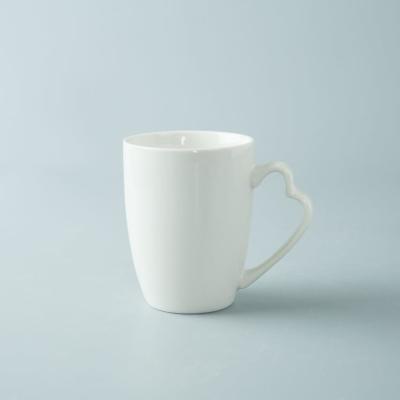 China SGS Approve Heart Shaped Handle White Ceramic Mugs , 10 Ounce Coffee Cups for sale